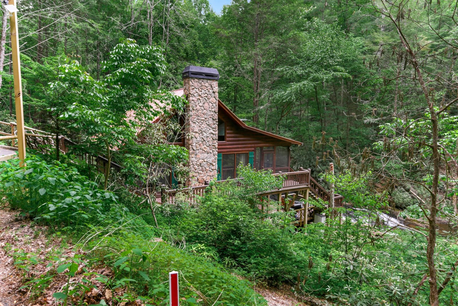 CABIN BUILT INTO CLIFFSIDE BEDROCK
